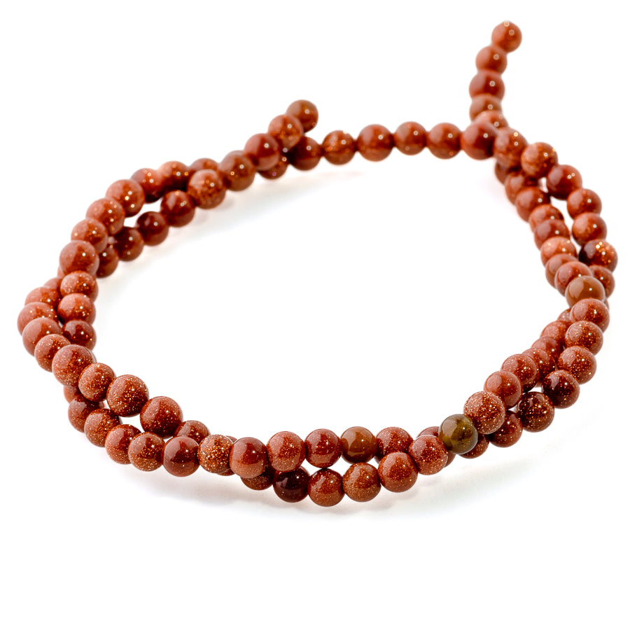 Goldstone 4mm Round - 15-16 Inch — Dakota Stones